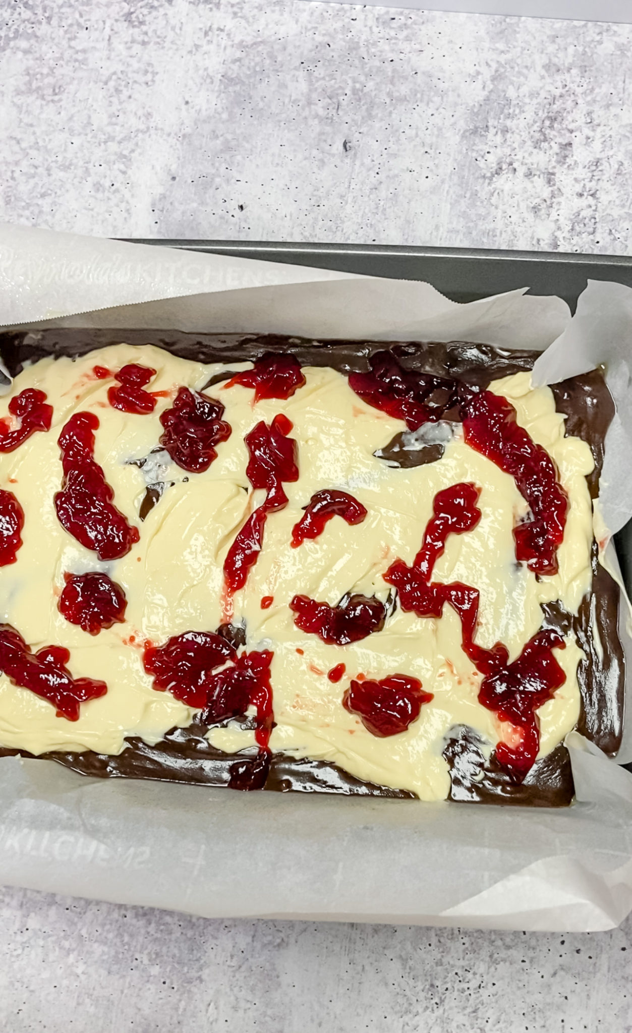 Raspberry Swirl Cheesecake Brownies - The Lazy K Kitchen